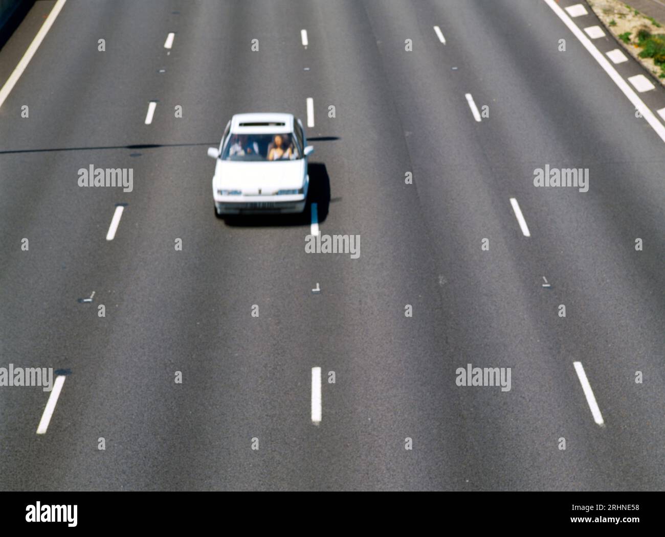 Overview of White Car On M25 Man & Woman In Front Seats England Stock ...