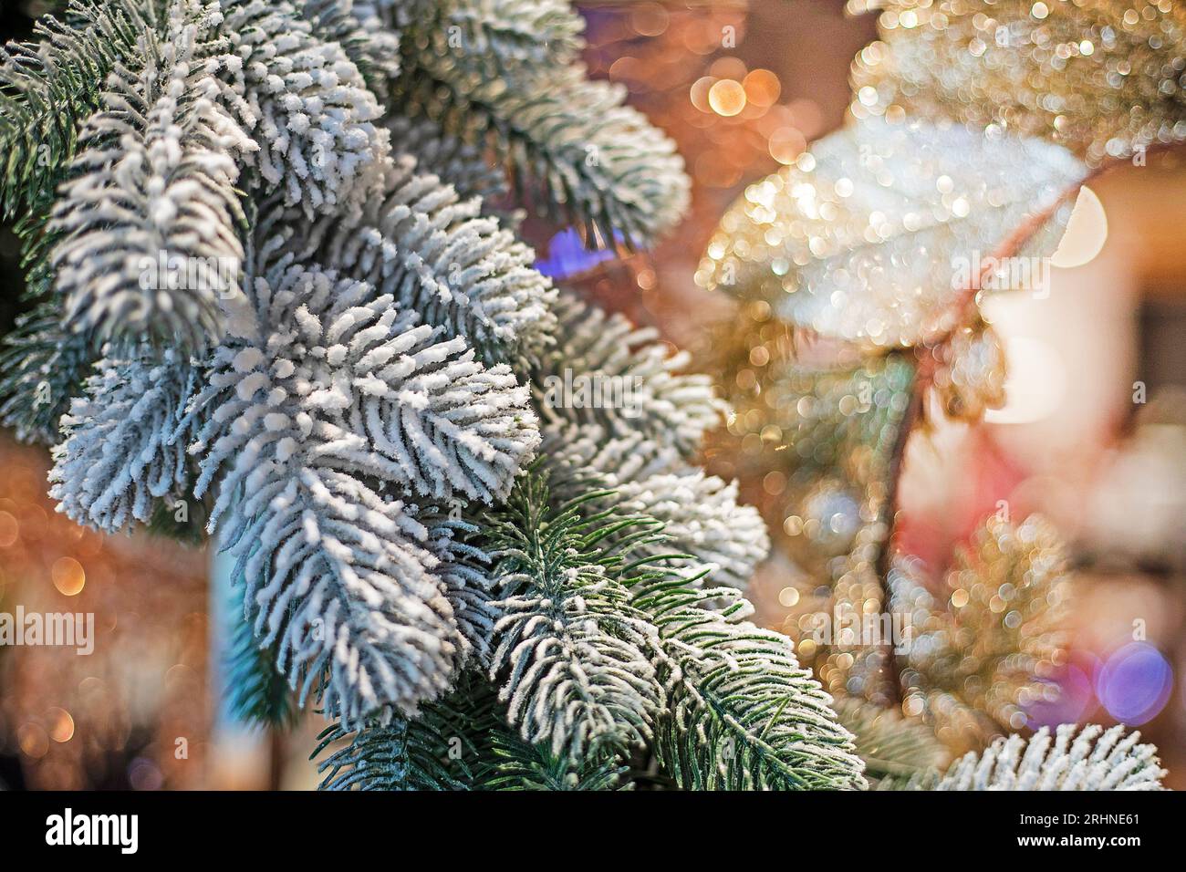branches of a christmas tree with lights. New Year Stock Photo - Alamy