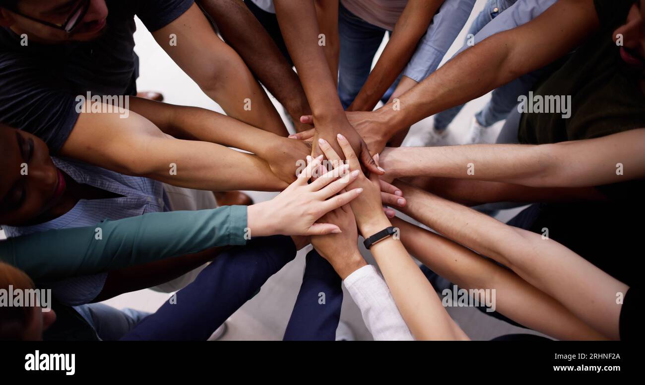 Business Team Huddle. Diverse Friends Hands Commitment Stock Photo - Alamy