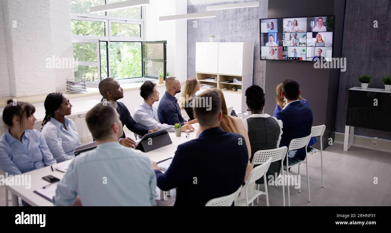 Online Video Conference Call In Boardroom Meeting Stock Photo - Alamy