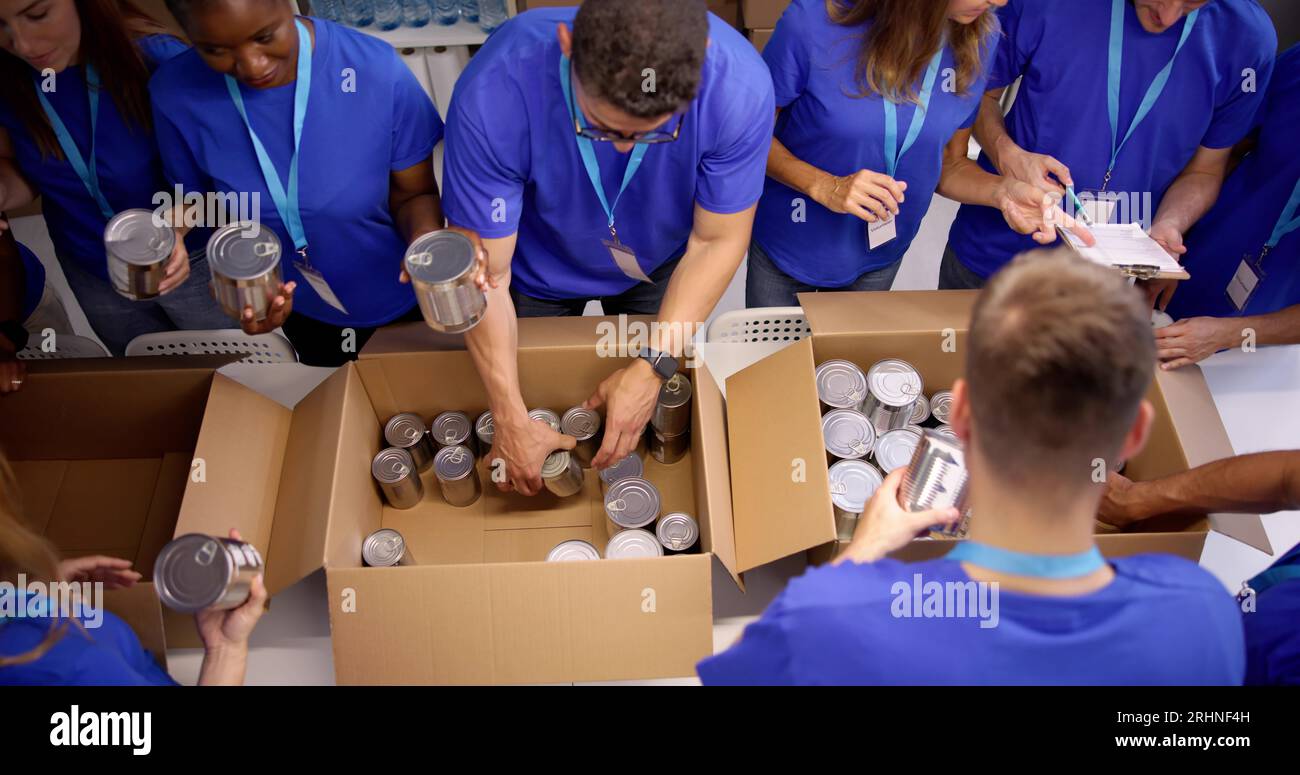 Food Bank Humanitarian Aid In Donation Boxes. Volunteer Community Stock ...