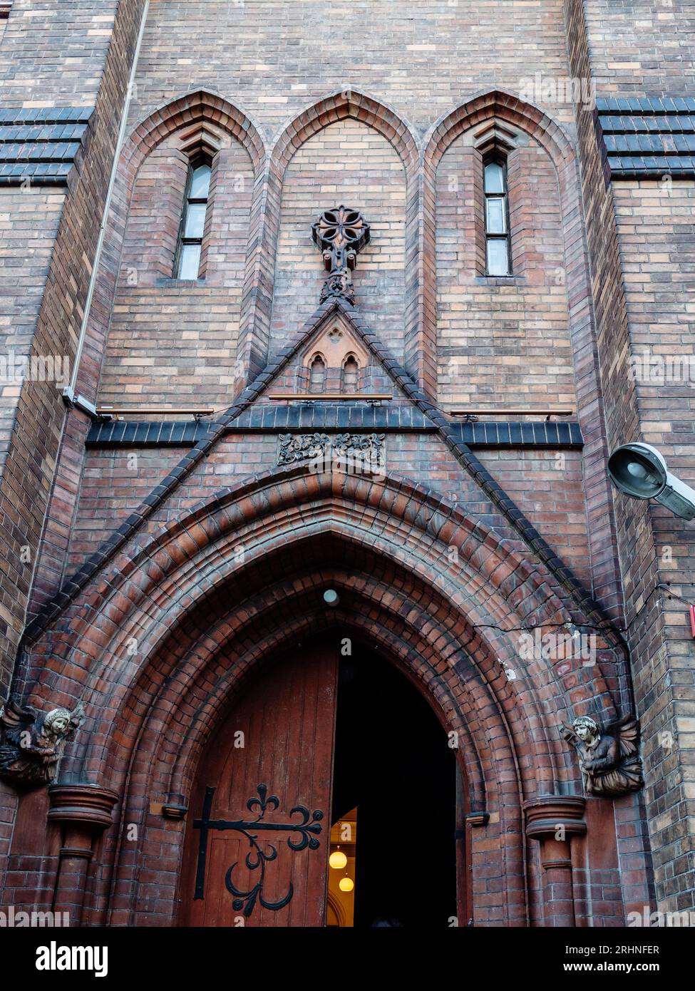 entrance to St Andrew's Anglican Church in summer twilight. The church ...