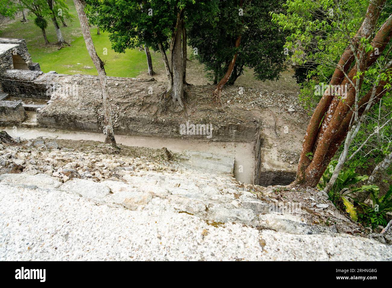 View down the steep stairway of Pyramid A1 to Structure A6 in the Mayan ...