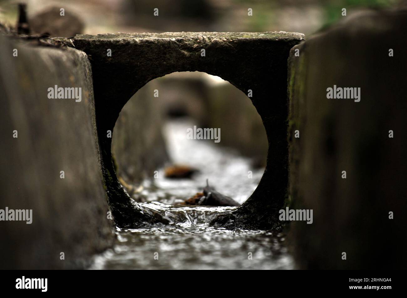 clear clean water flowing through rocky hole. clear clean water flowing ...