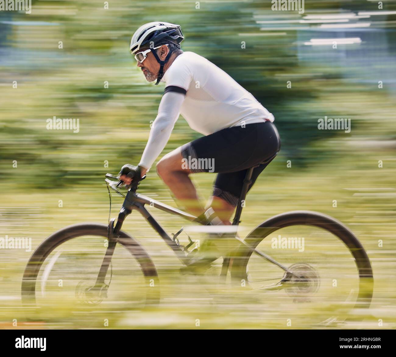 Fitness, freedom and man cycling in forest for speed, training or ...