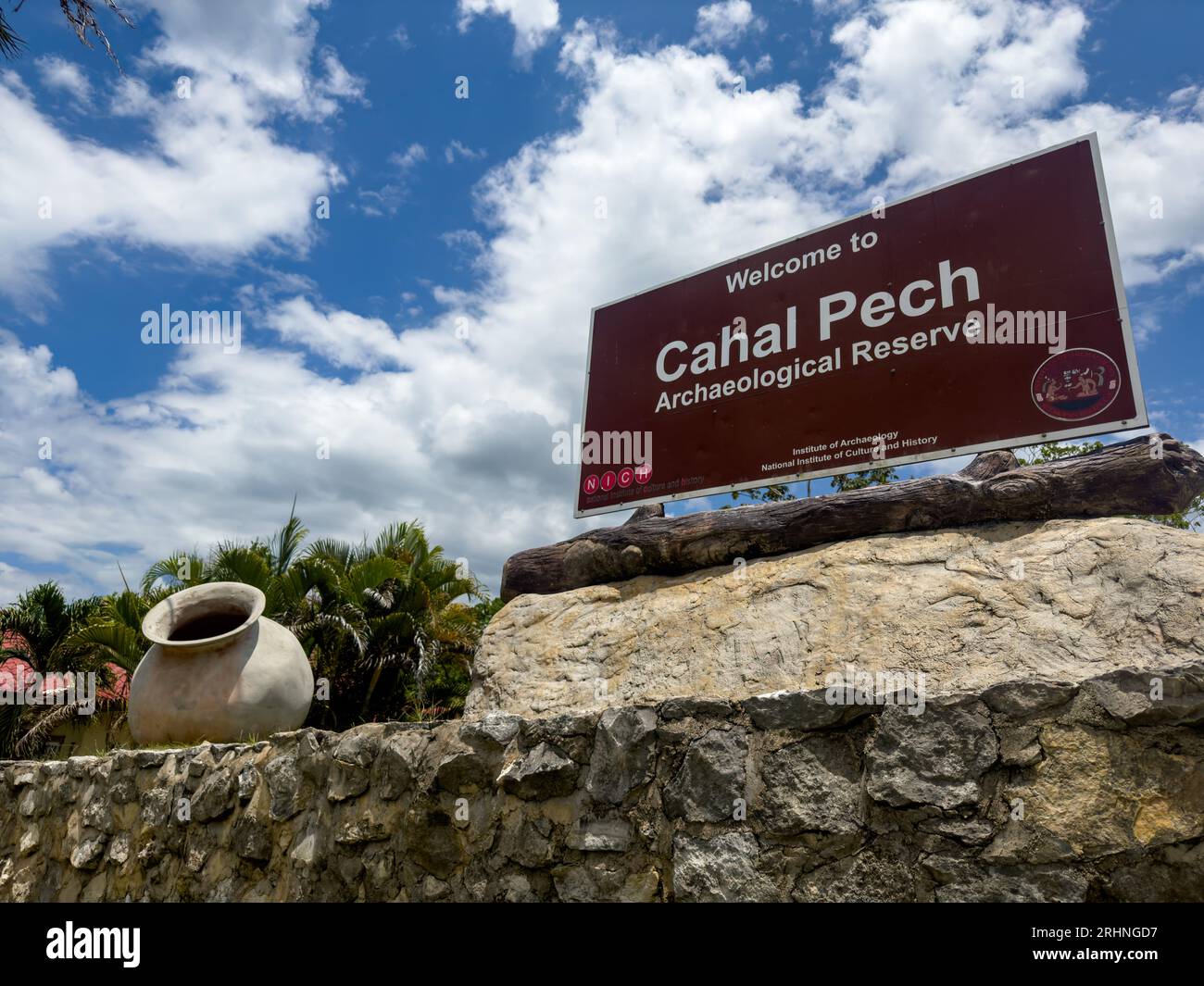 Entry sign for the Mayan ruins in the Cahal Pech Archeological Reserve ...