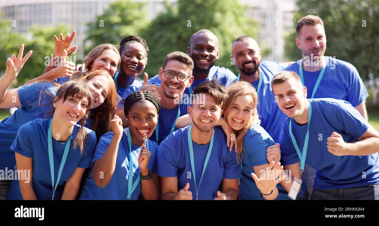 Cheerful Volunteer Team In Park. Multiethnic Teamwork Stock Photo - Alamy