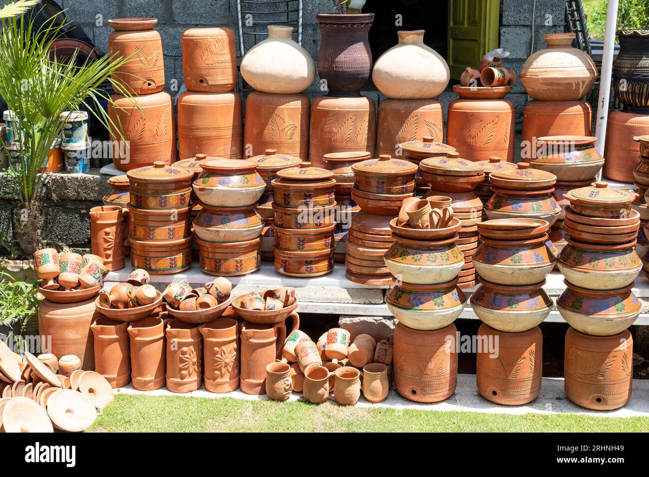 Different sizes and shapes pottery display on the shop counter Stock ...