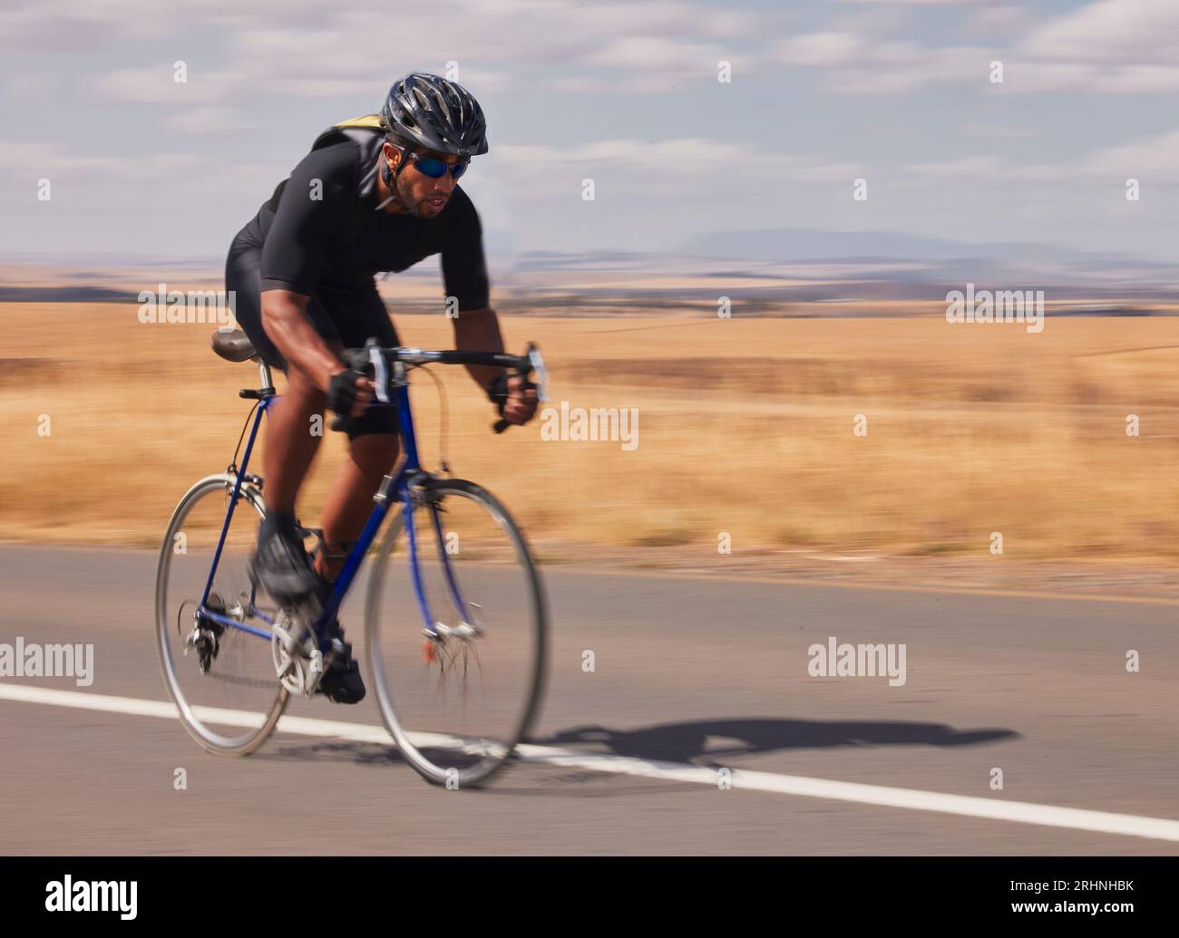 Speed, nature and man cycling on road for workout, exercise and scenic ...