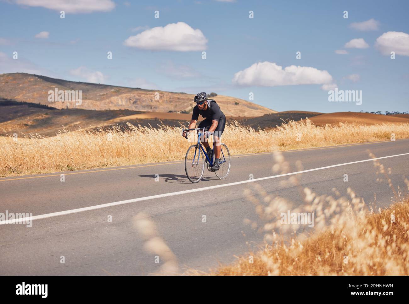 Fitness, nature and man cycling on road for workout, exercise and ...