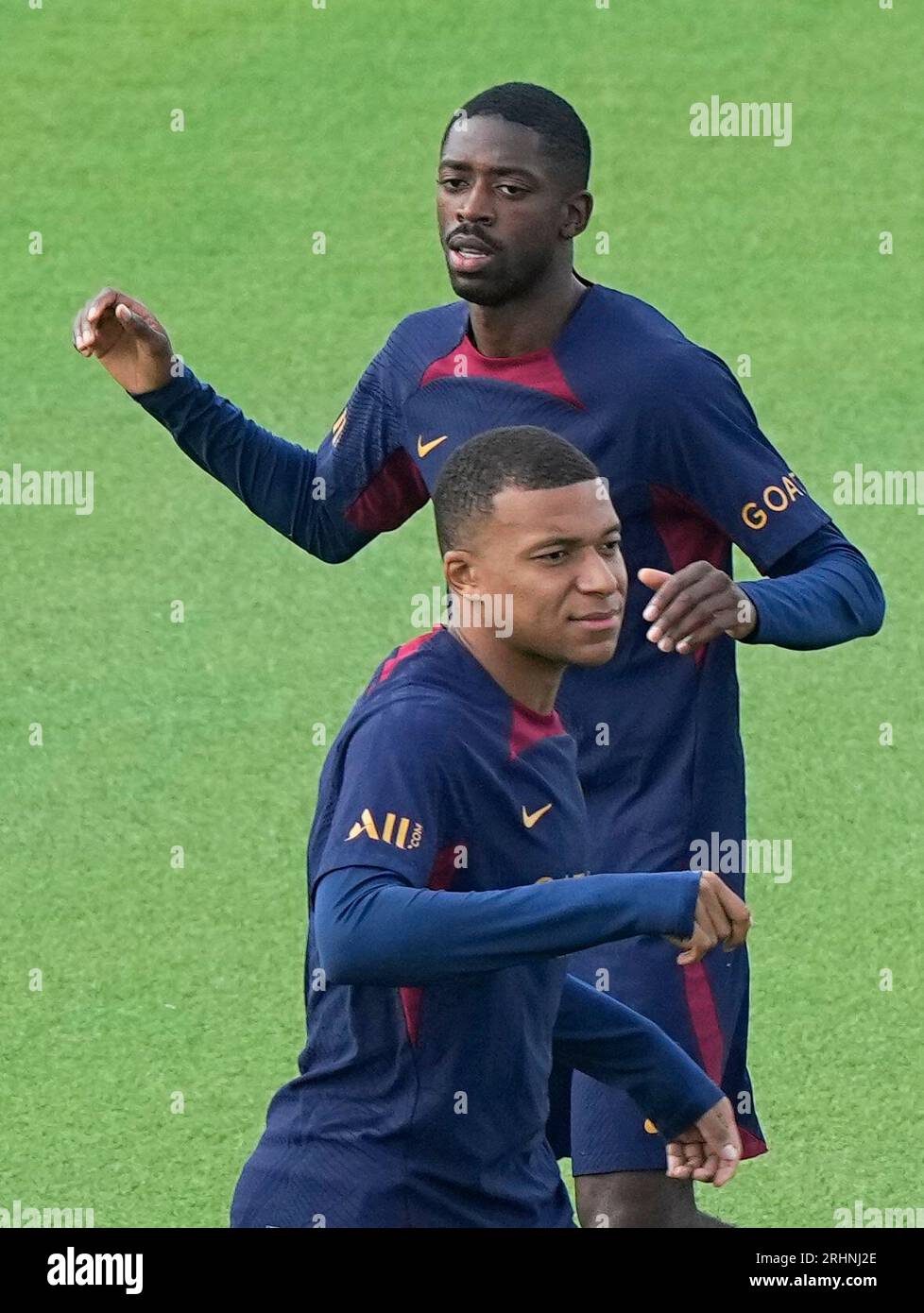 PSG's Kylian Mbappe, front, and PSG's Ousmane Dembele train at the ...