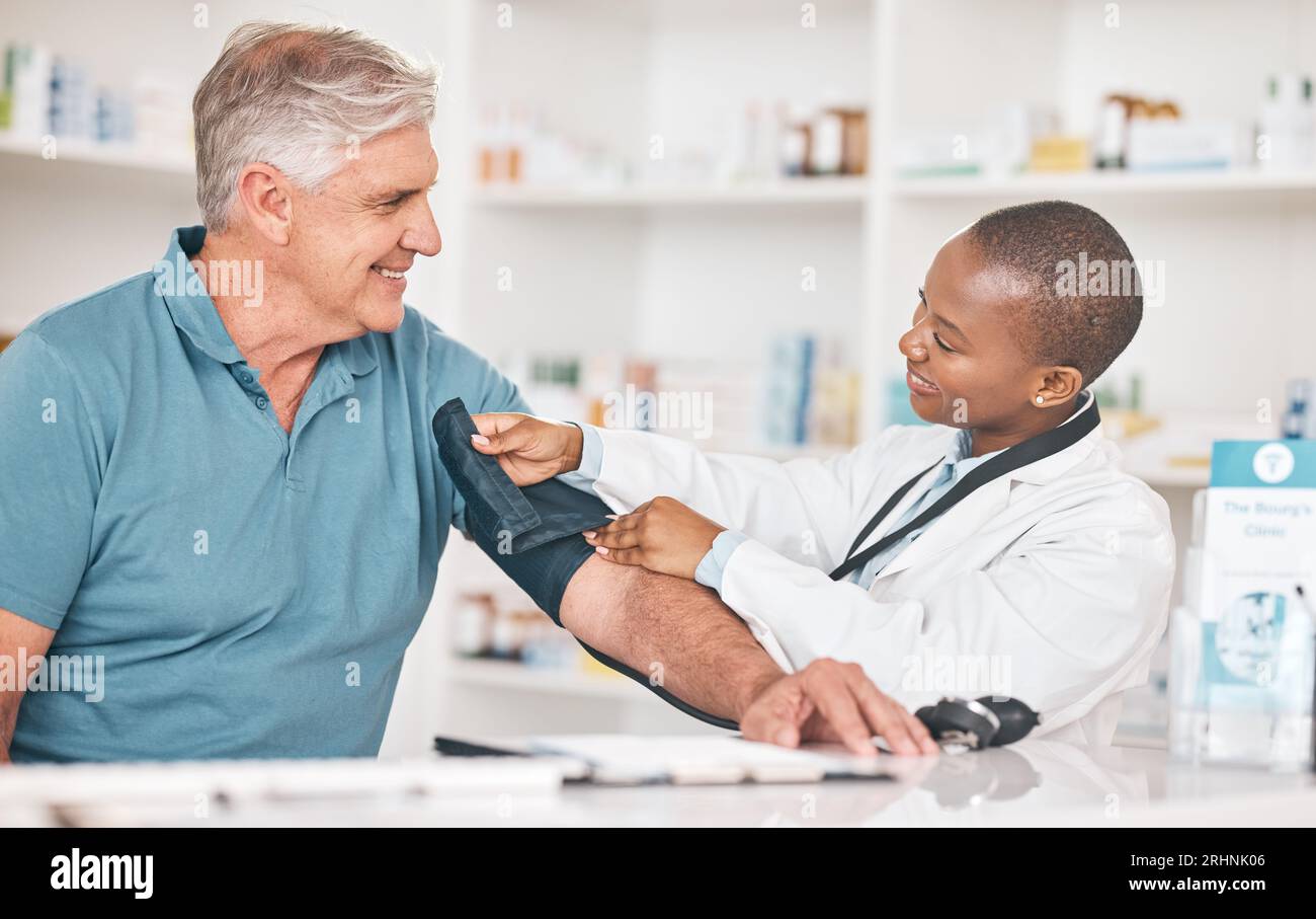 Pharmacist, senior man and blood pressure check with helping hand, test ...