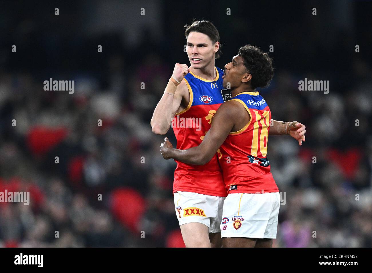 Melbourne, Australia. 18th Aug, 2023. Eric Hipwood of Brisbane (left ...