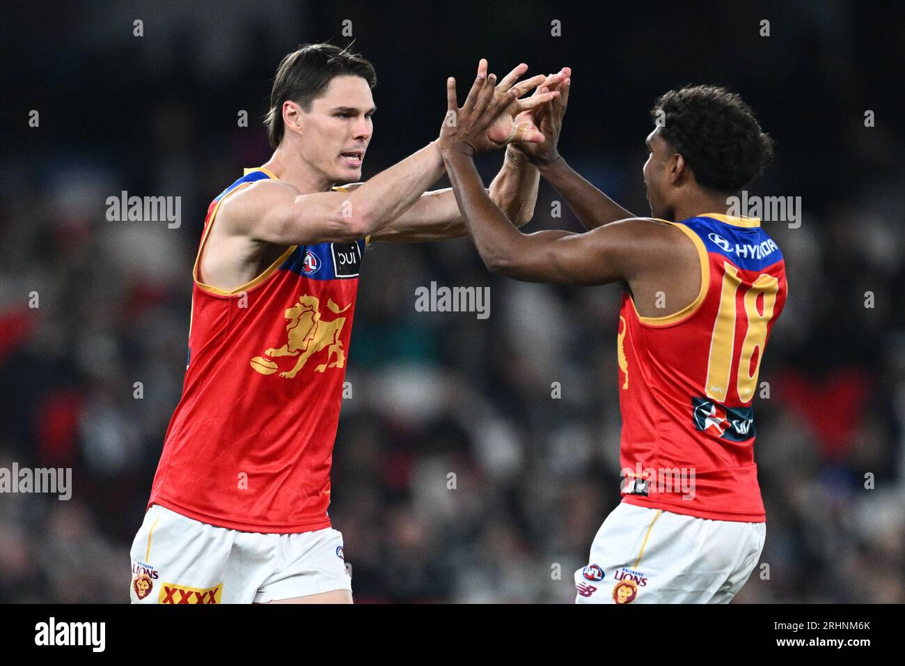 Melbourne, Australia. 18th Aug, 2023. Eric Hipwood of Brisbane (left ...