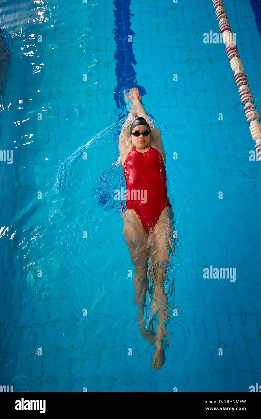 Adult female swimmer training in swimming pool Stock Photo - Alamy