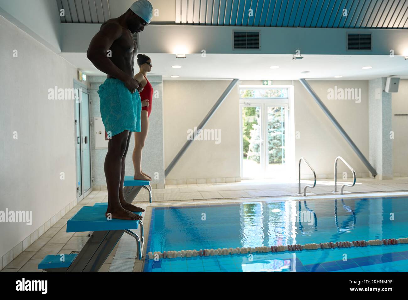 Two female swimmers in pool hi-res stock photography and images - Alamy