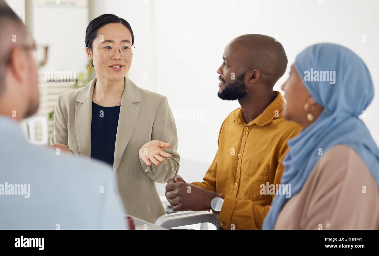 Collaboration, meeting and a designer team talking in the office while ...