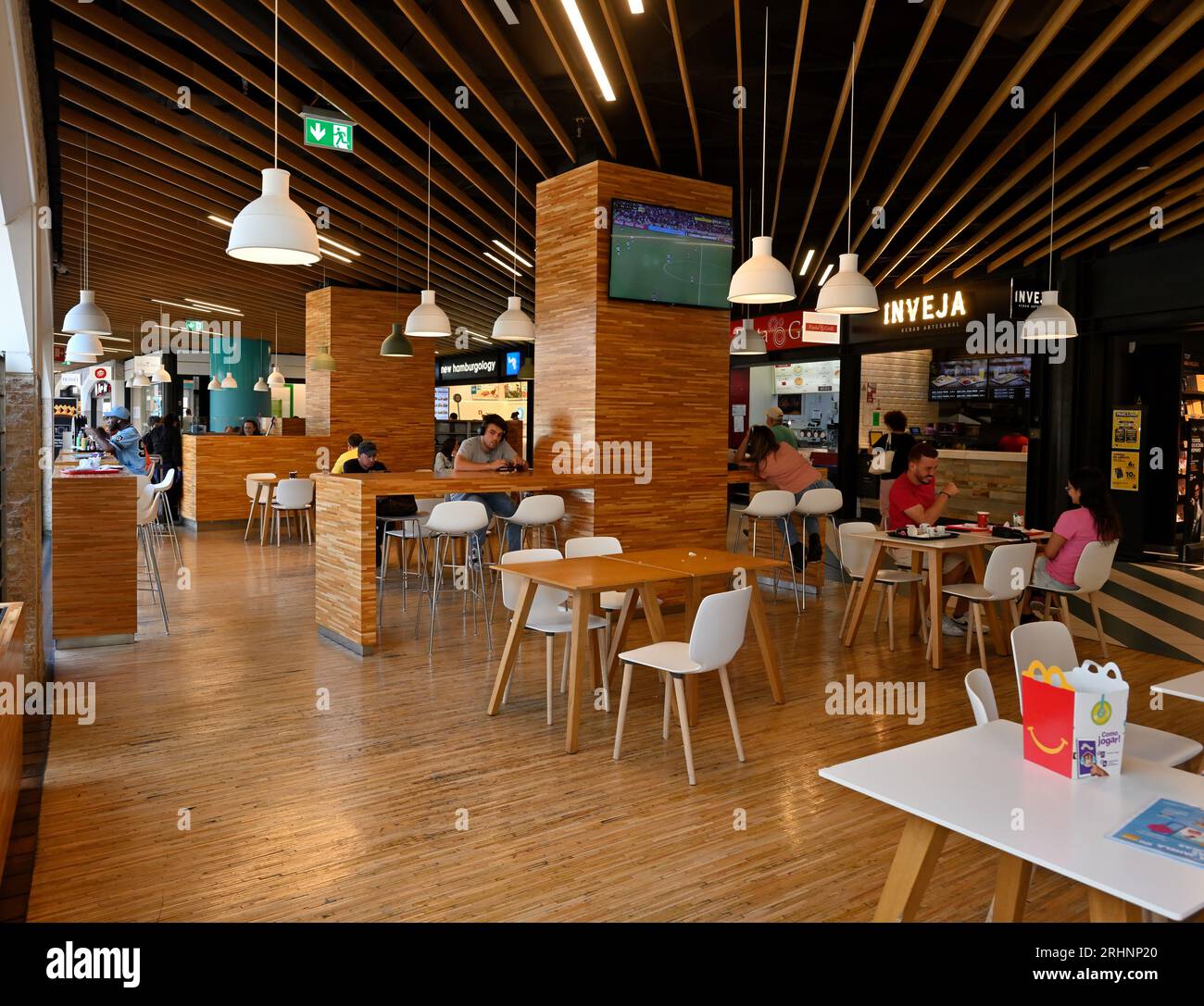 Inside Fnac shopping centre food court with variety of restaurant and ...