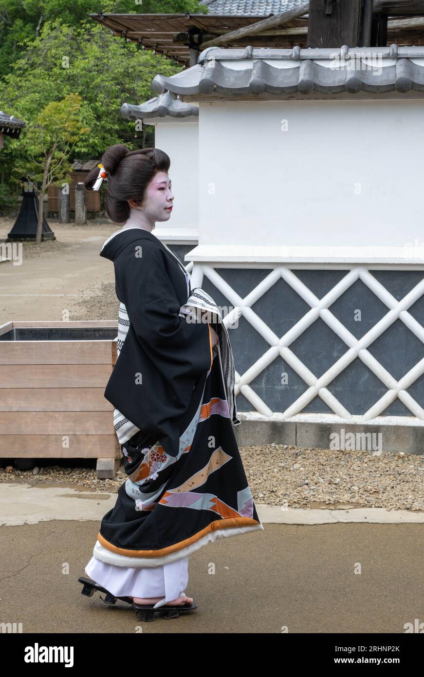 Oiran courtesans parade through the streets of Edomura Wonderland with ...
