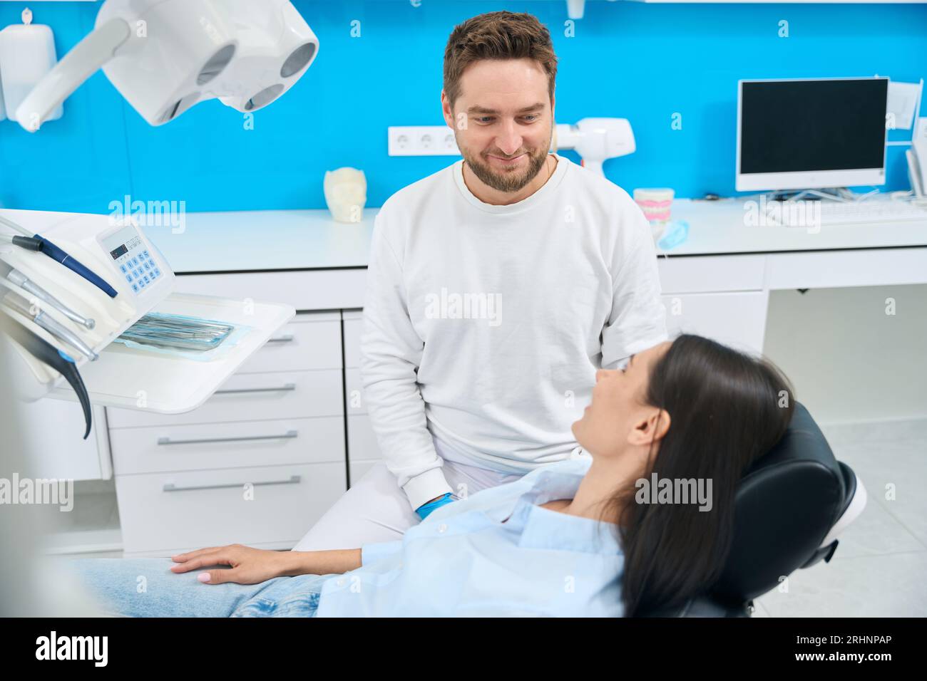 Woman visiting dentist office, routine check-up to prevent dental ...