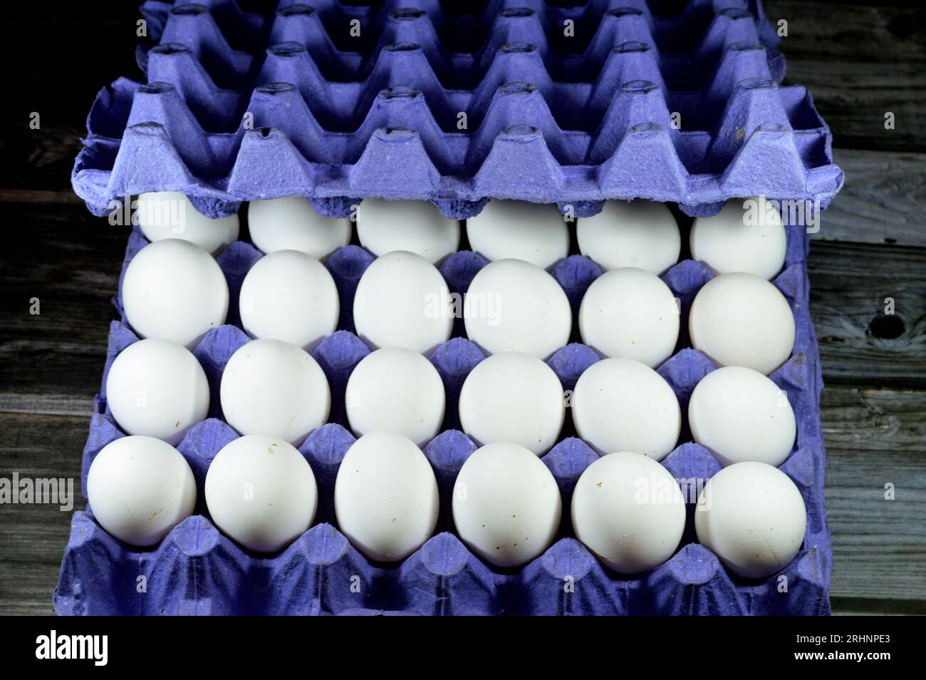 Pile of organic fresh and raw hen chicken white eggs, stack of eggs ...