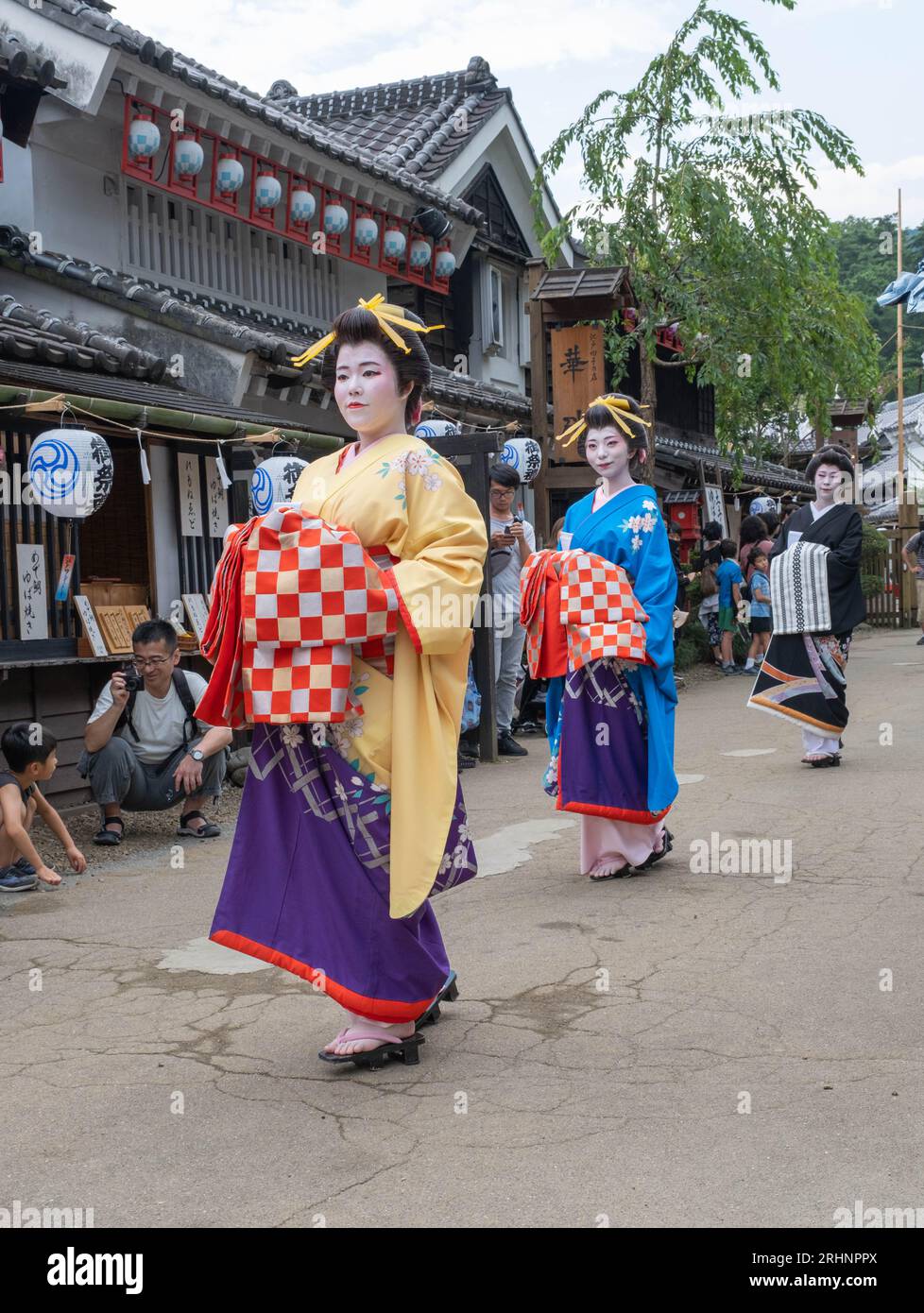 Oiran courtesans parade through the streets of Edomura Wonderland with ...