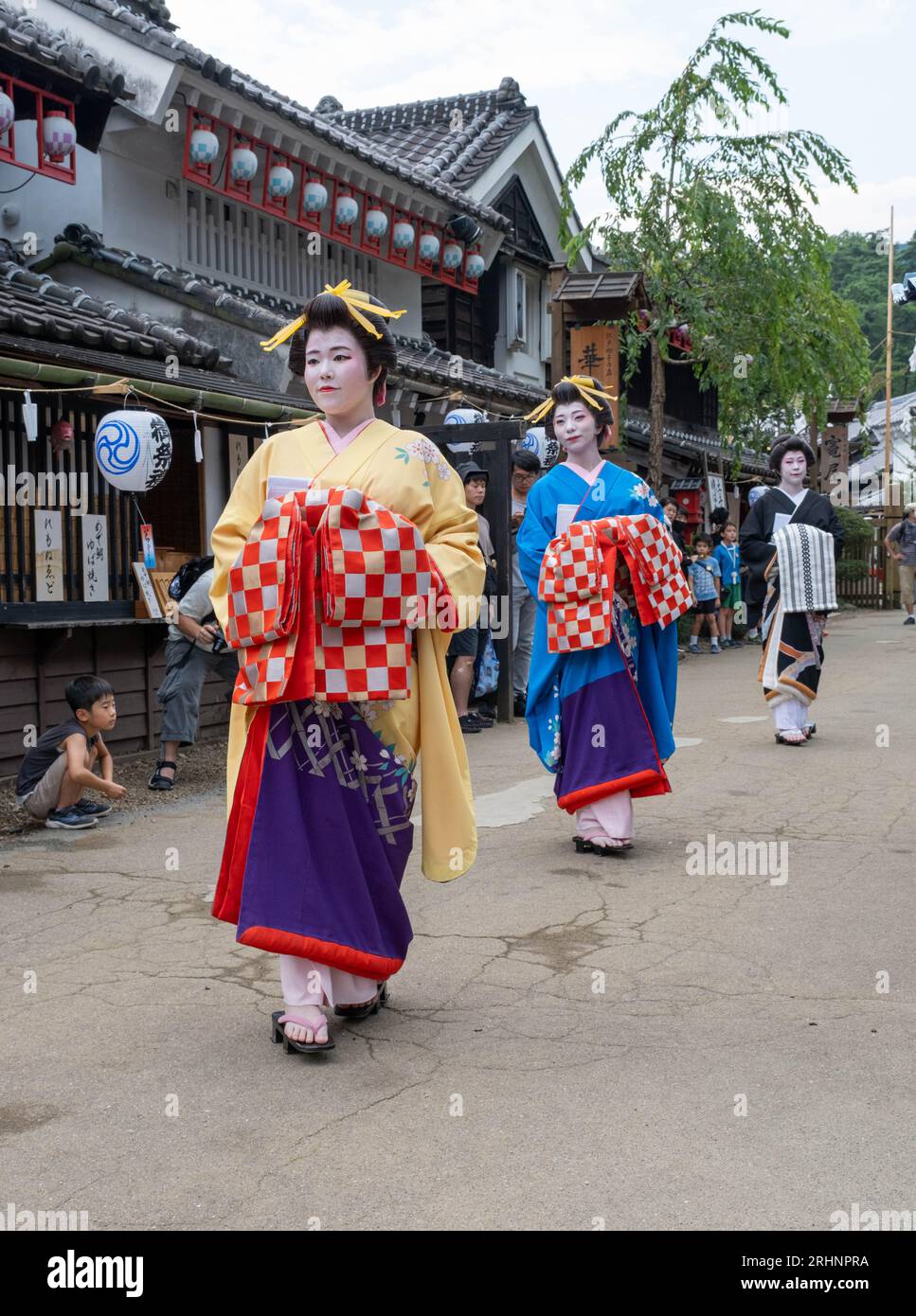 Oiran courtesans parade through the streets of Edomura Wonderland with ...