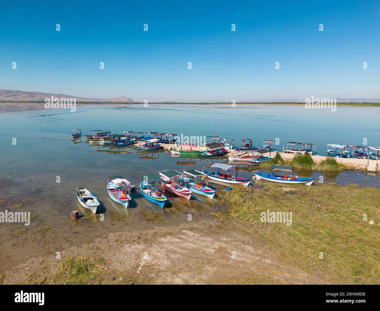 Decorated excursion boats in Isikli lake in Civril, Denizli Stock Photo ...