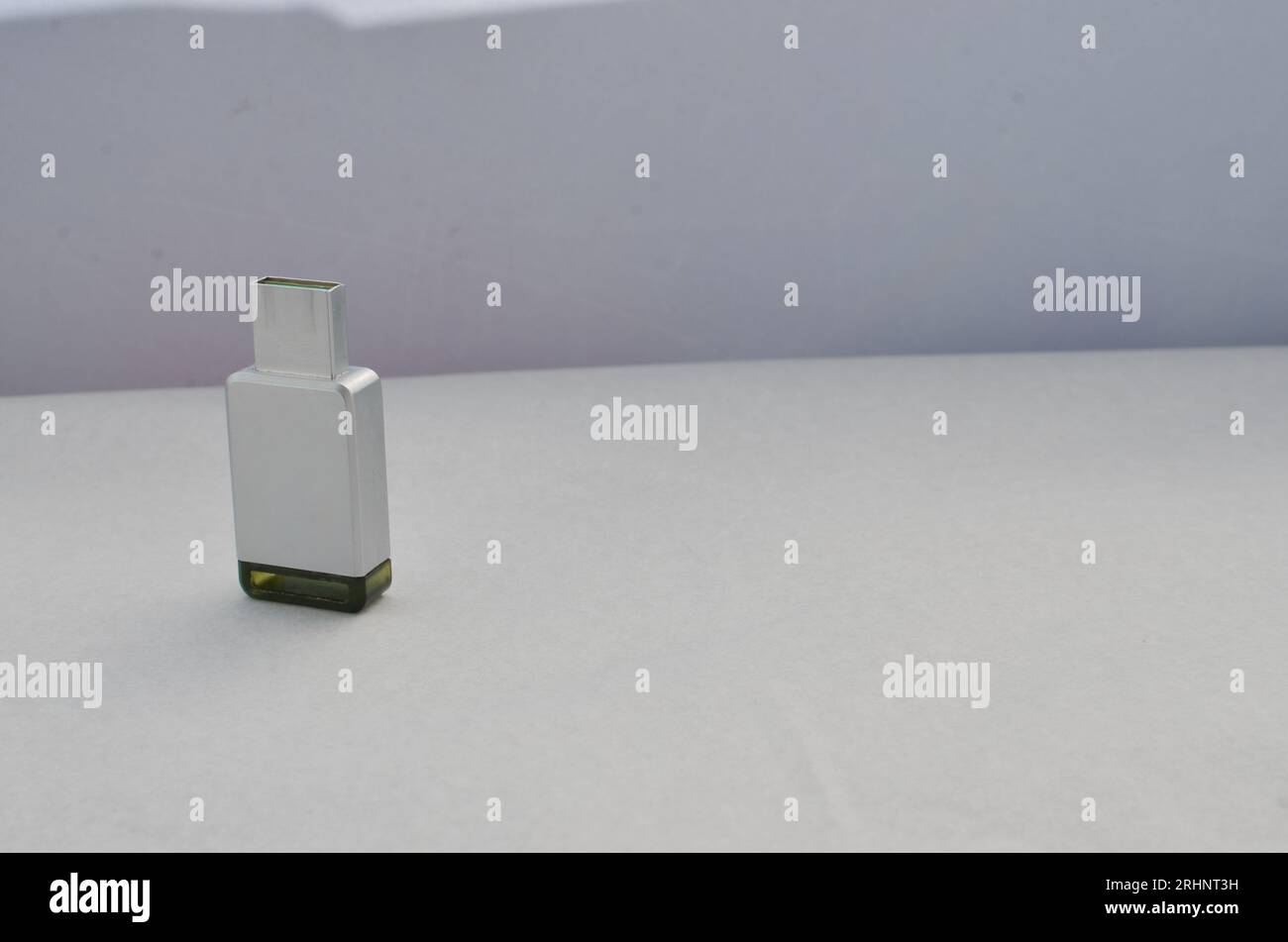 Aluminum flash drive close-up, modern and sturdy USB storage stick ...