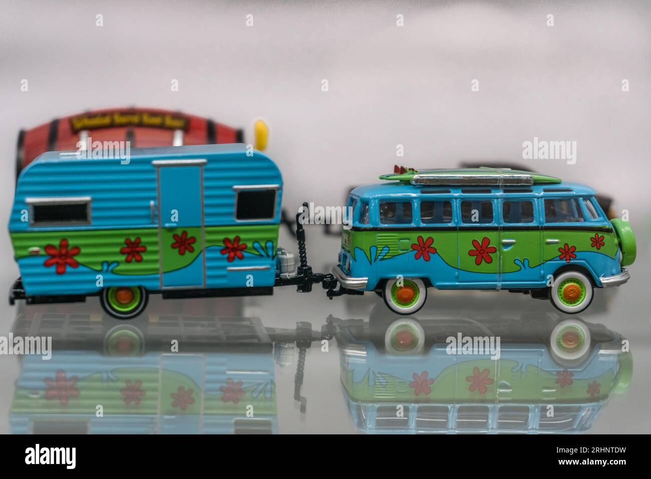 Toy or model blue and green Volkswagen van with camping trailer on ...