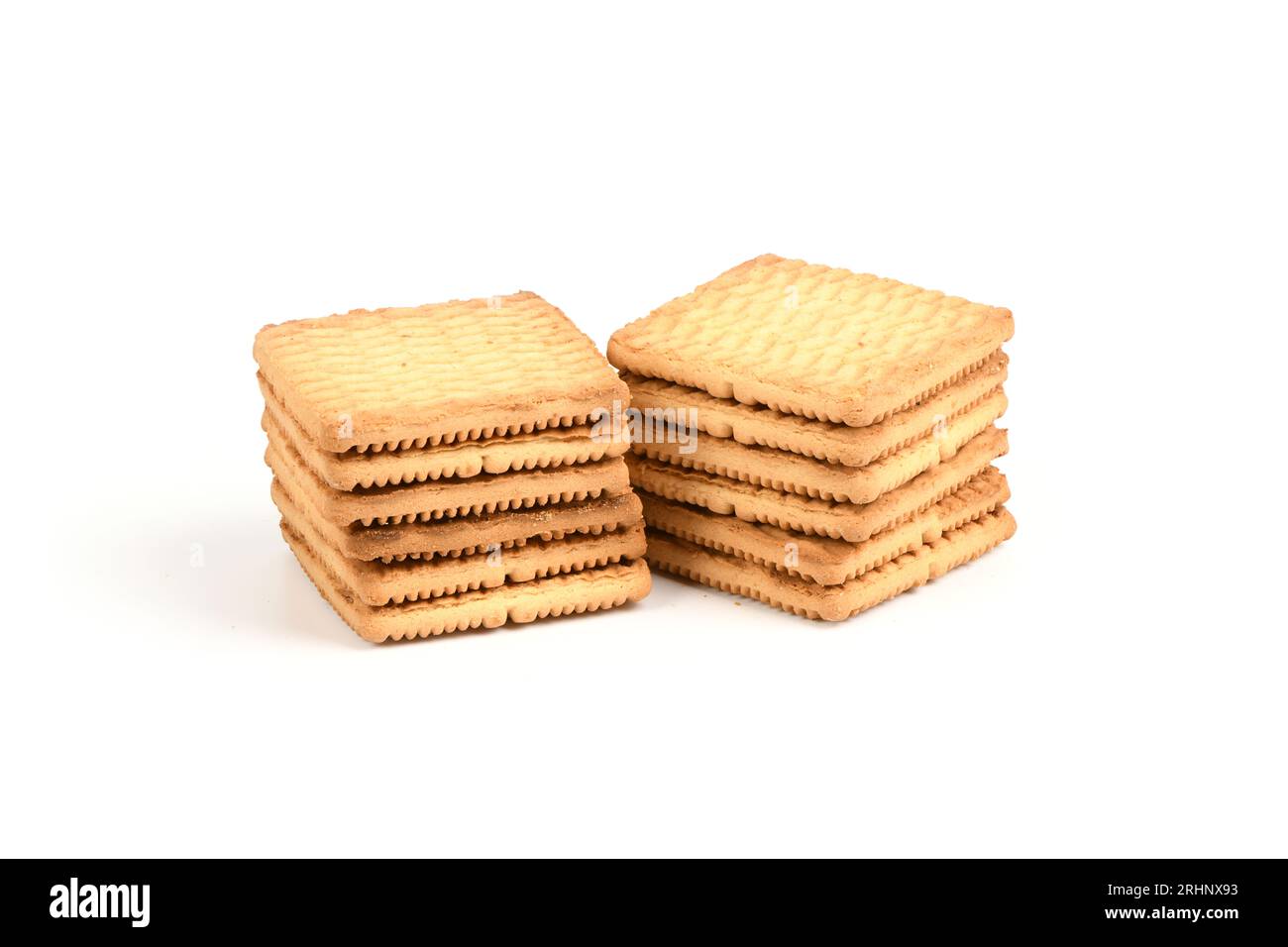 Square shortbread cookies isolated on white background. Stacked butter ...