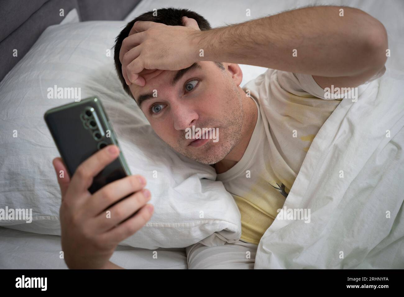 Shocked person bed hi-res stock photography and images - Alamy