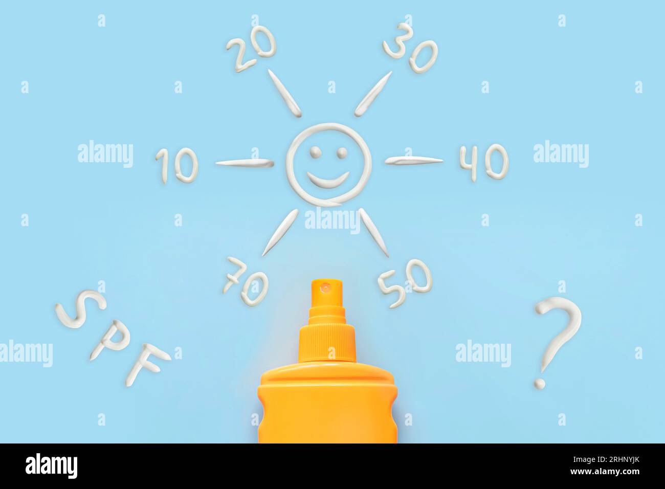 sunscreen, orange bottle, sun protection on blue background. spray to ...