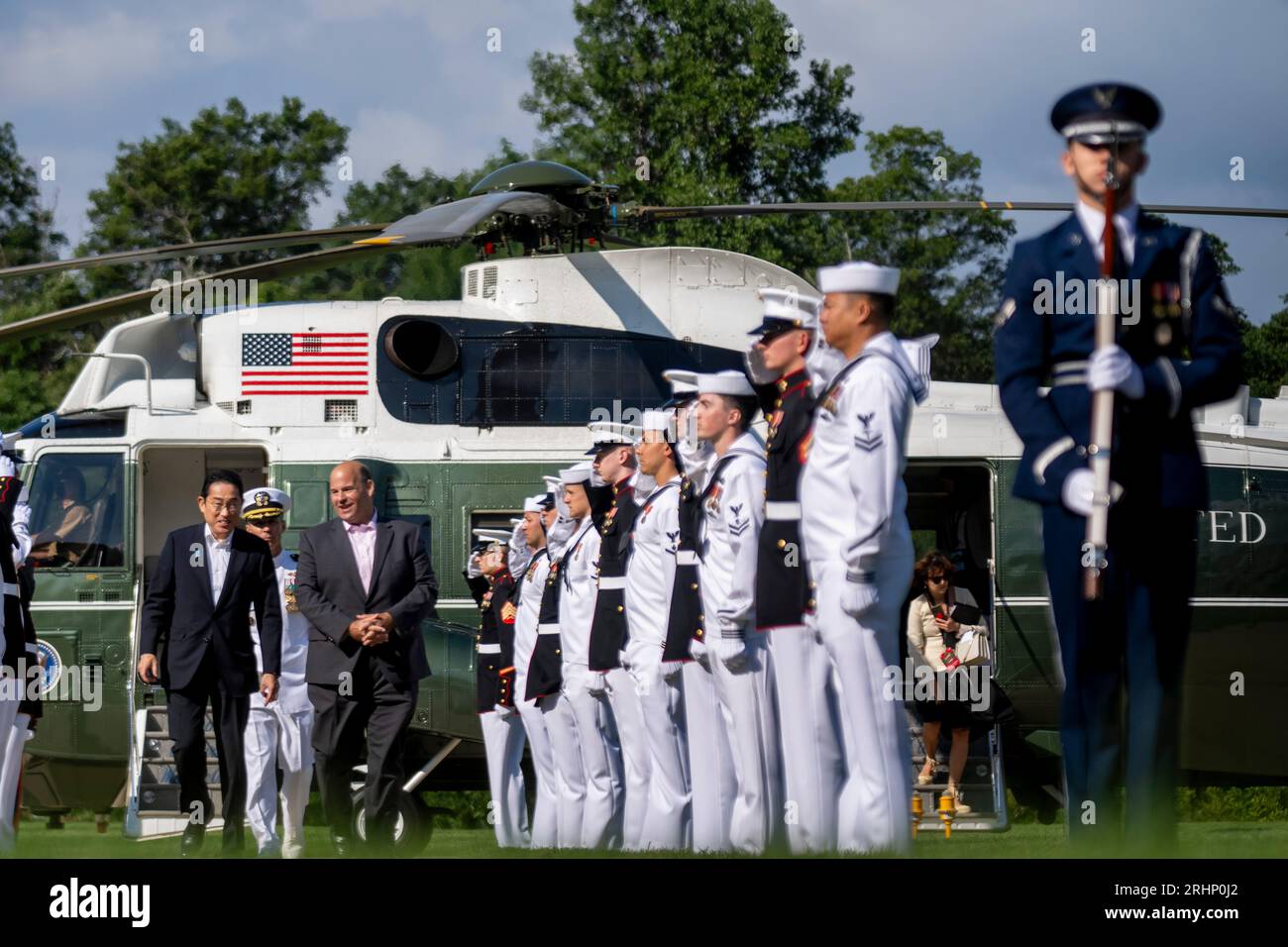 Japan's Prime Minister Fumio Kishida is greeted by acting Chief of ...