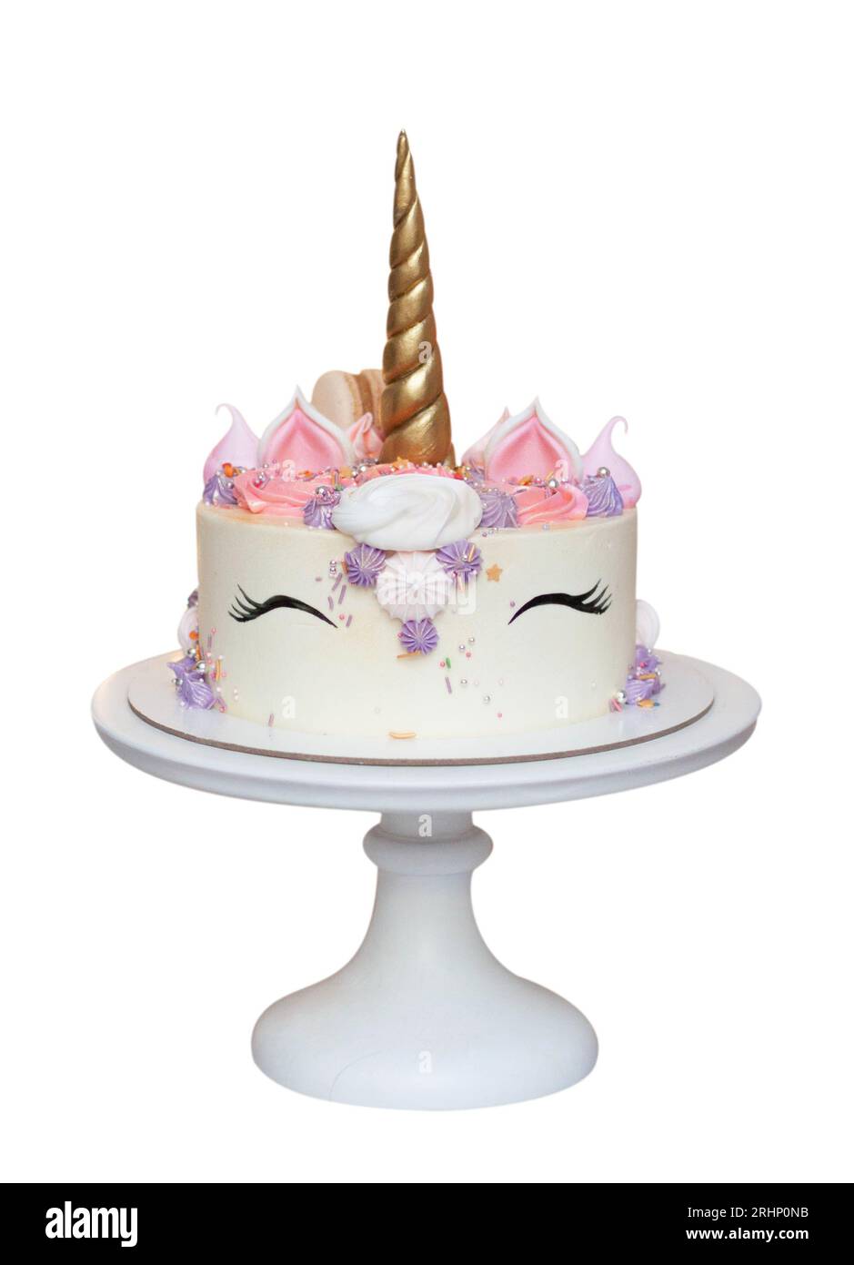 Gorgeous unicorn cake with golden waffle horn, eyelashes and cream ...
