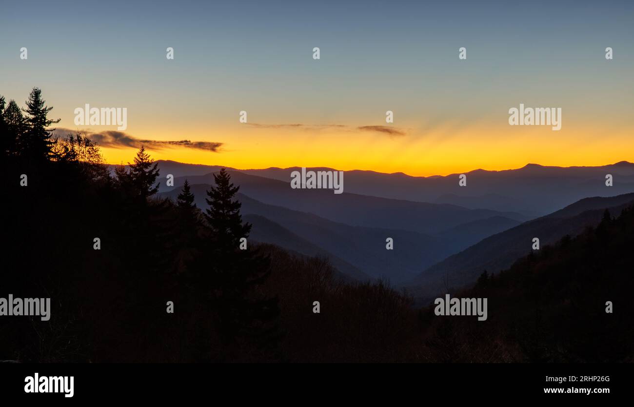 Rays of light emerge over the horizon at Luftee Gap in Great Smoky ...