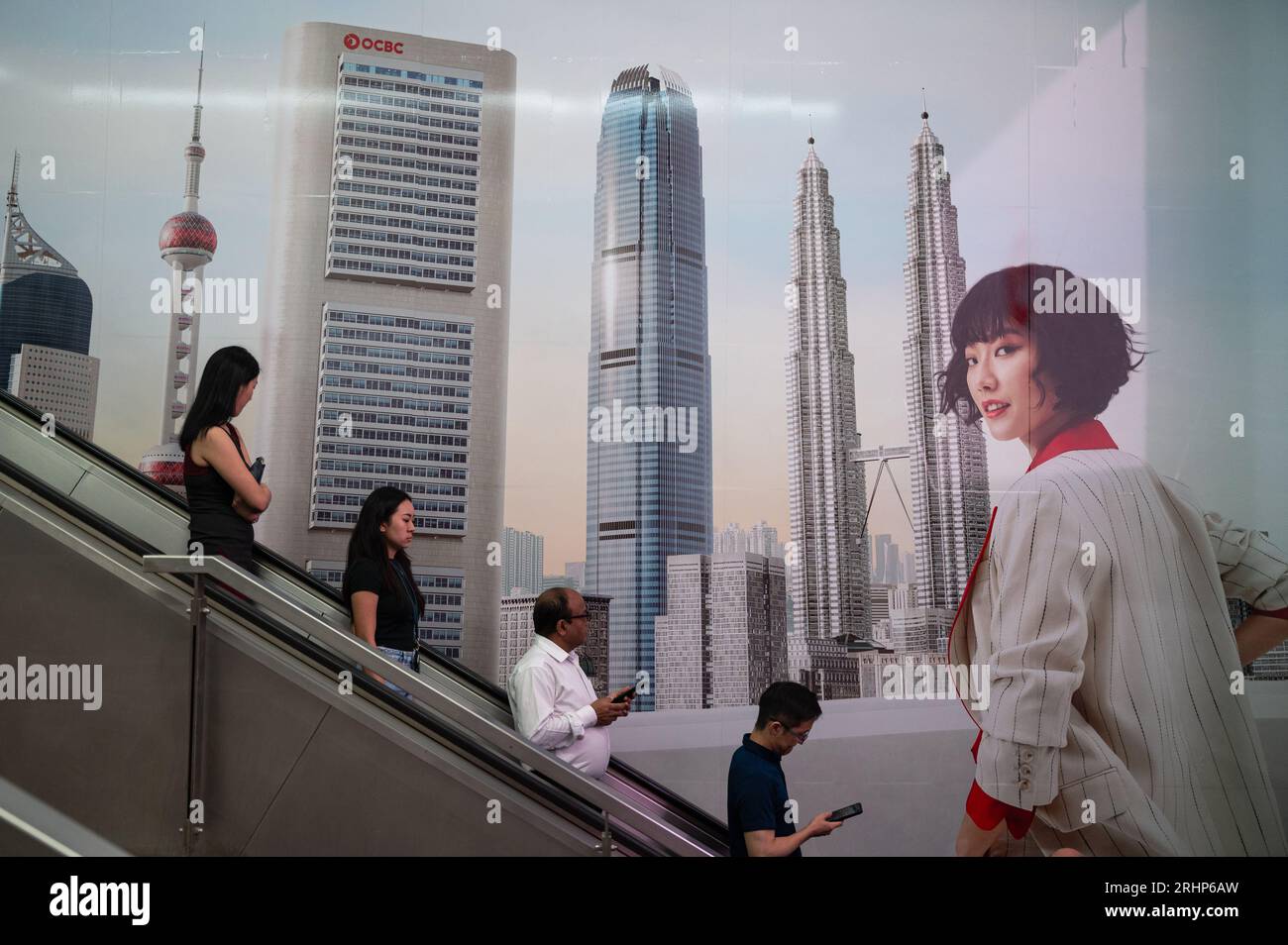 27.07.2023, Singapore, Republic of Singapore, Asia - People on an ...