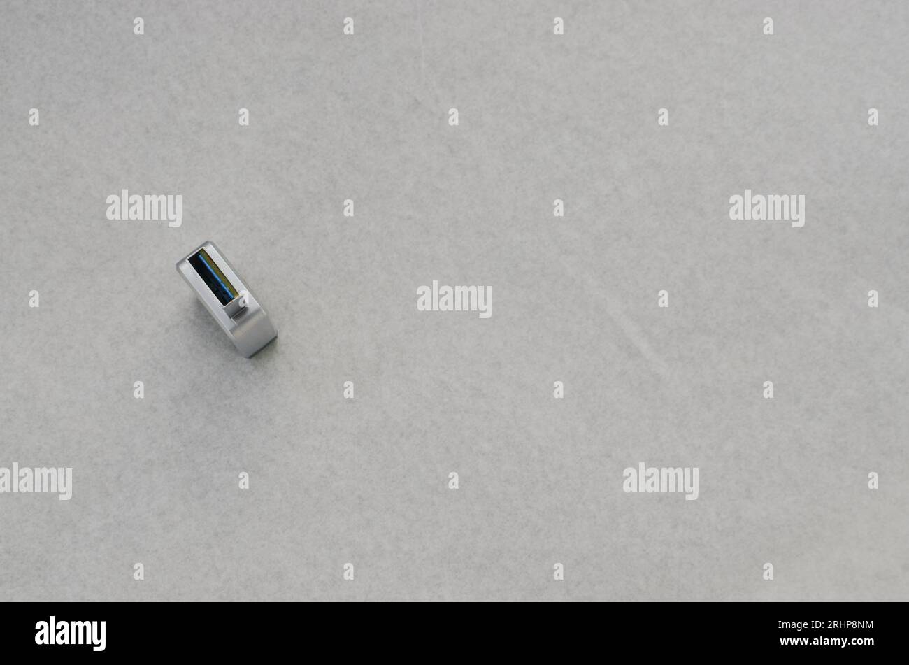 Aluminum flash drive close-up, modern and sturdy USB storage stick ...