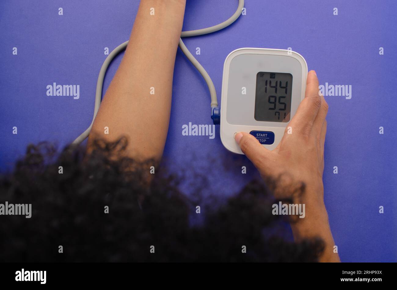 Detail of a modern blood pressure measuring device, symbolizing the ...