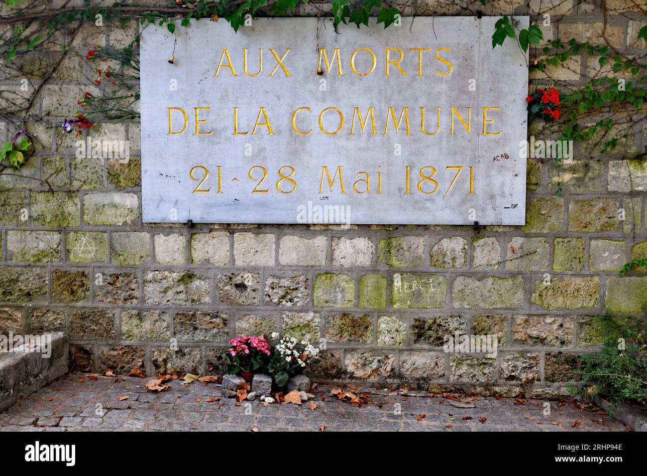 A memorial in Paris' Père Lachaise Cemetery at the Communards' Wall ...