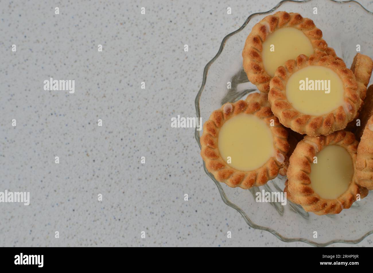 Close-up of delicious biscuits in the form of tartlets filled with ...