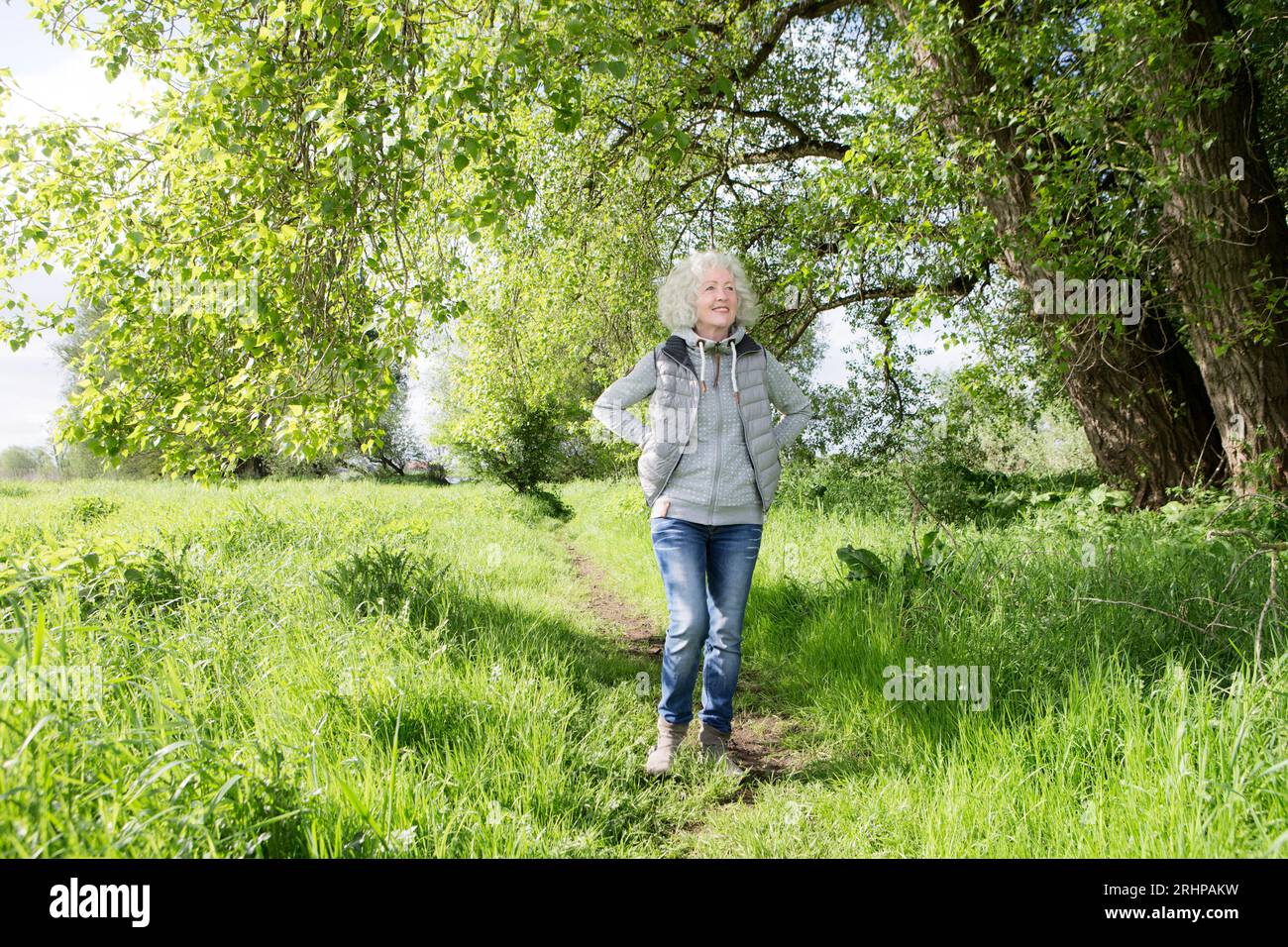 Elderly woman walking side view hi-res stock photography and images - Alamy