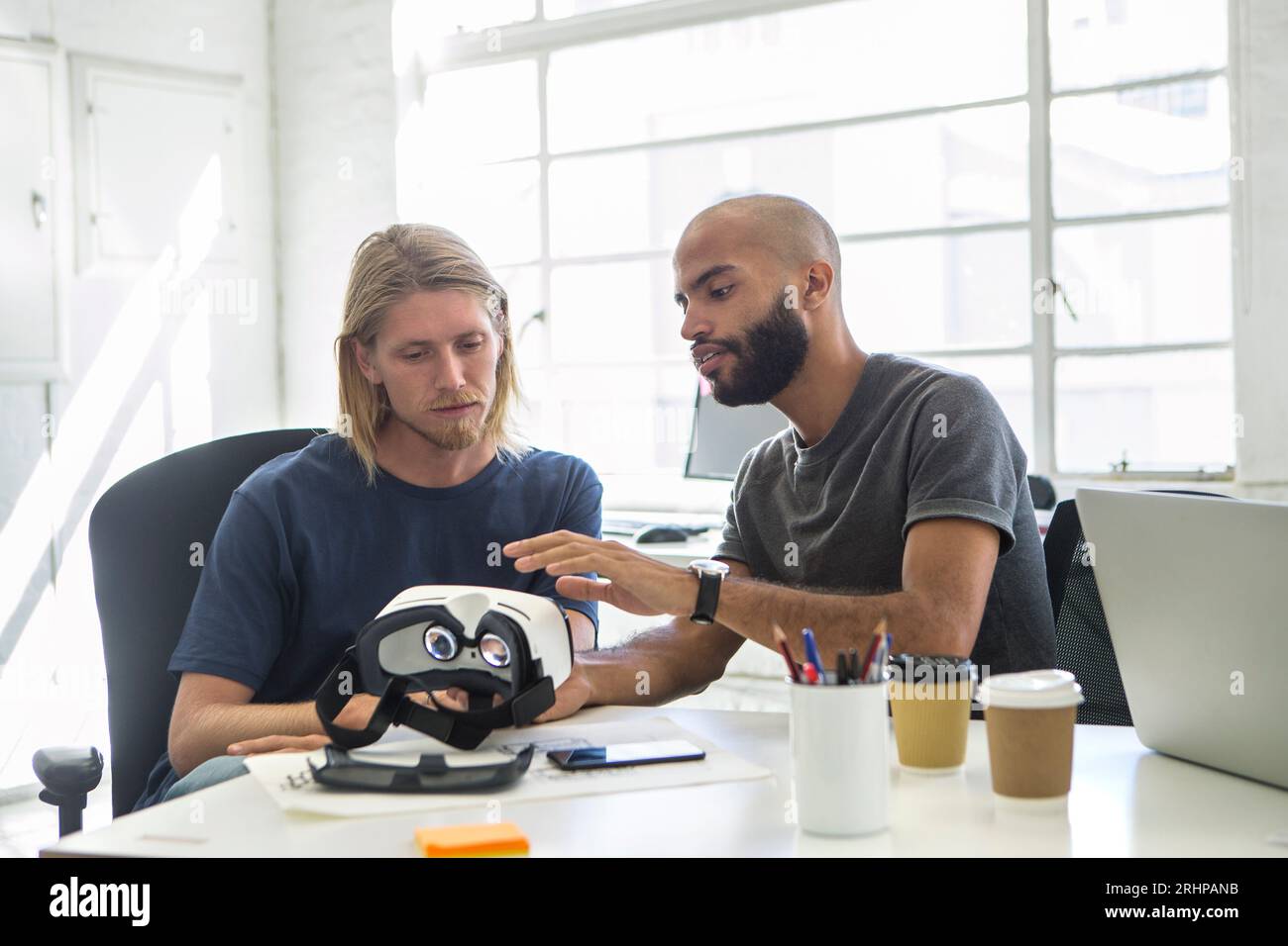Men in conversation Stock Photo - Alamy