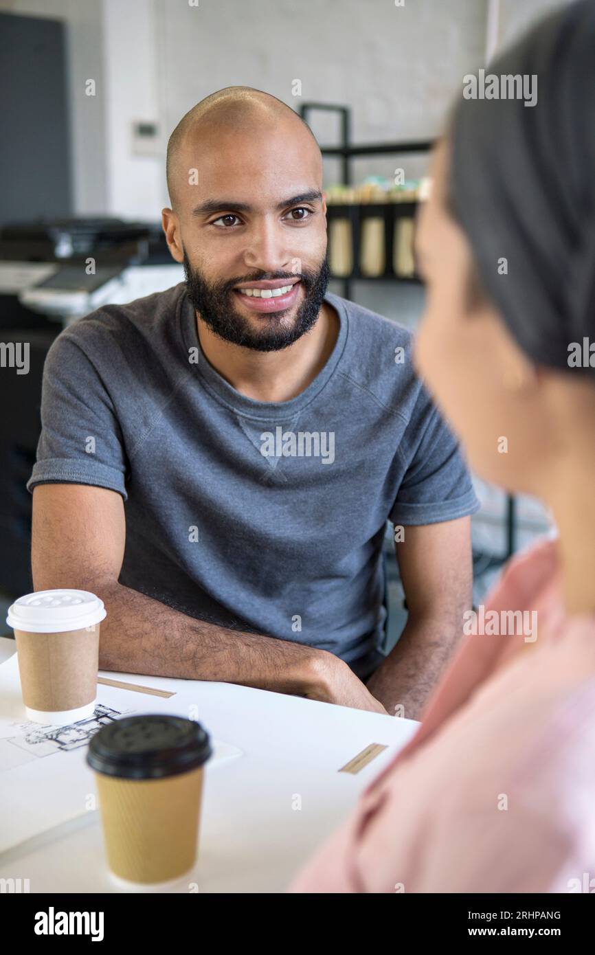 Young people in conversation, startup Stock Photo - Alamy