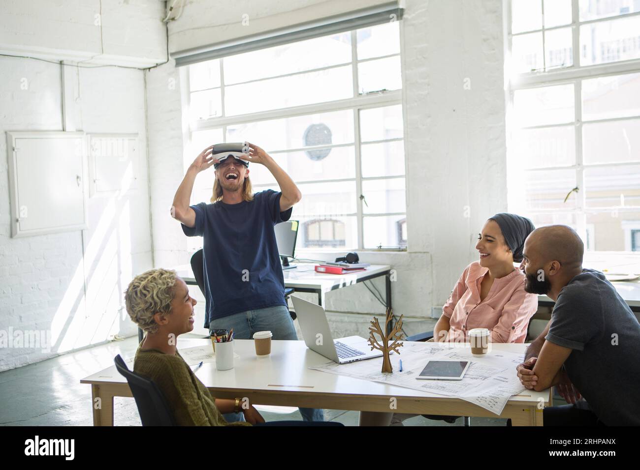 Young people at work Stock Photo - Alamy