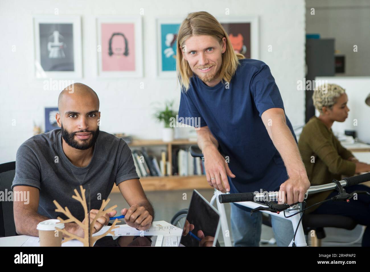 Young men at work Stock Photo - Alamy