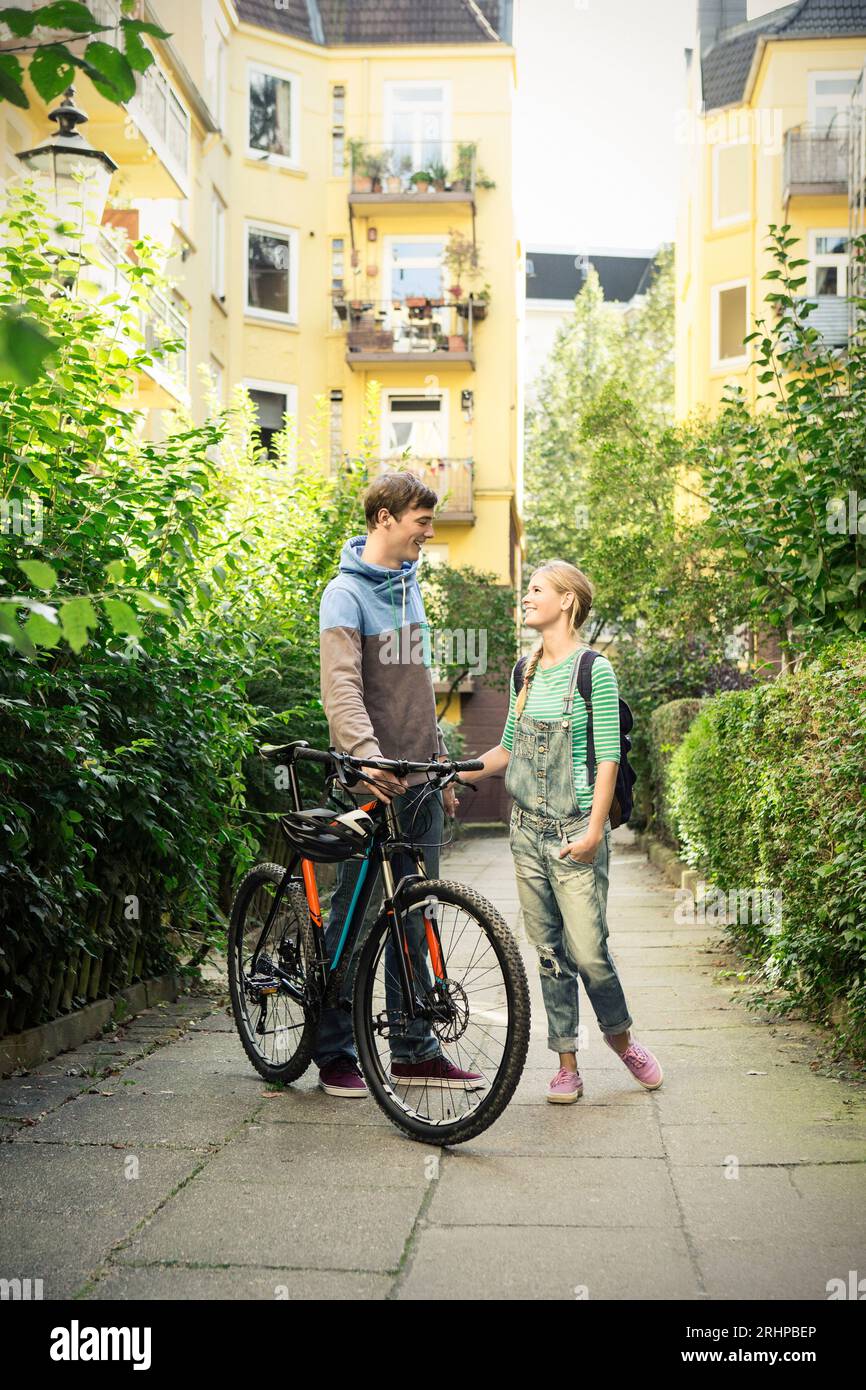 Couple on bicycle Stock Photo - Alamy