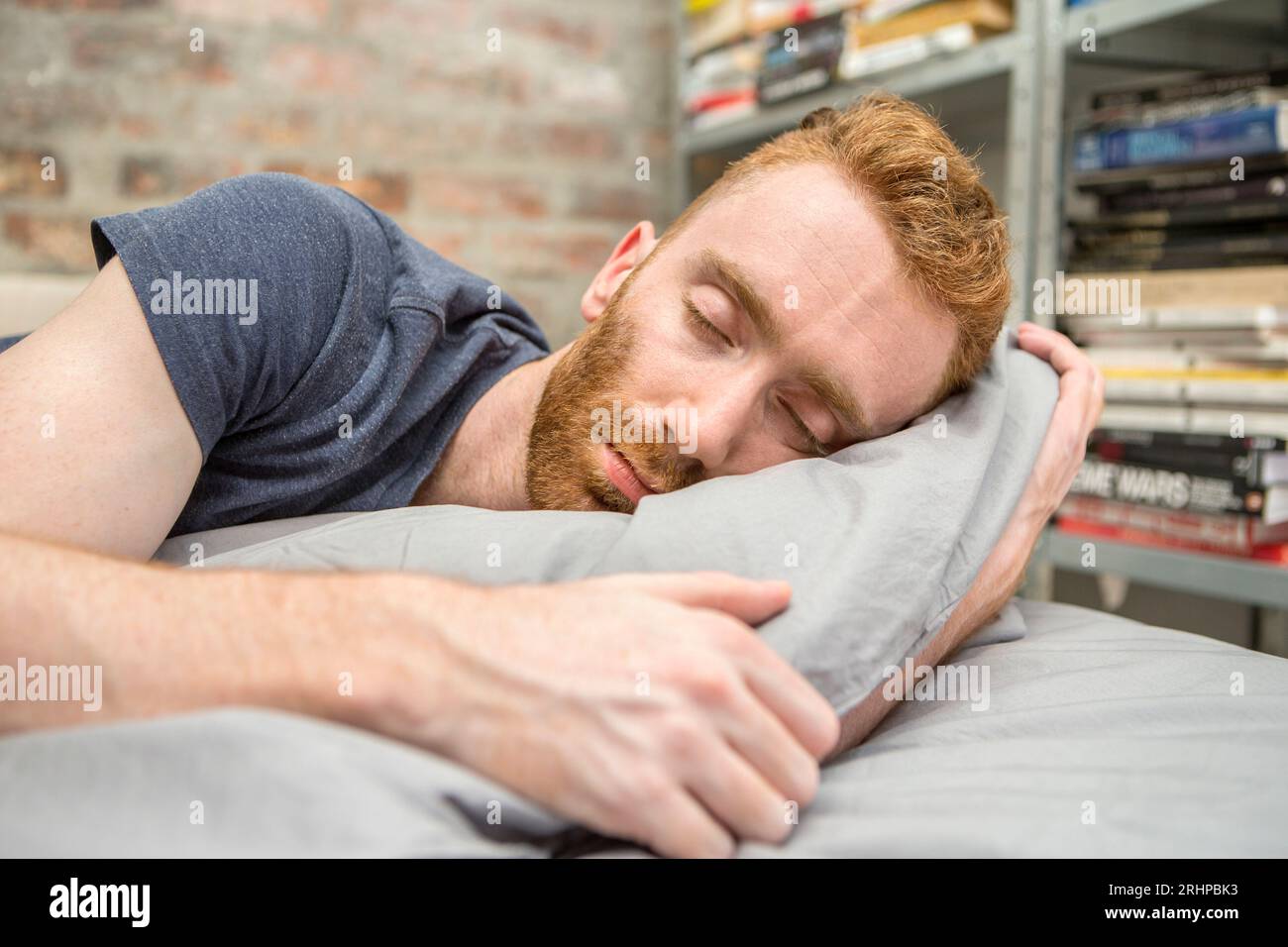 Young man sleeping well hi-res stock photography and images - Alamy