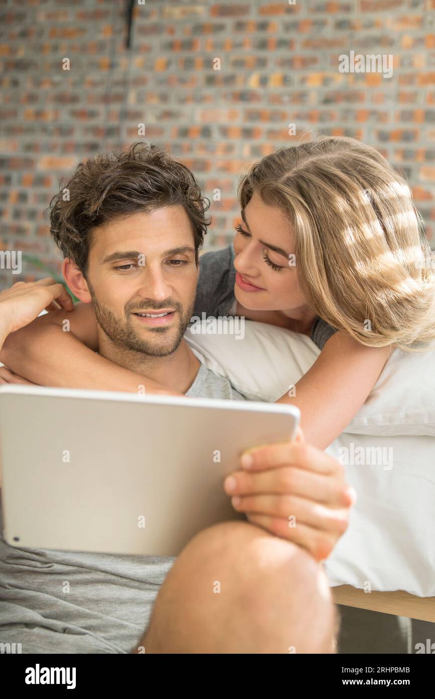 Ipad in bed hi-res stock photography and images - Alamy