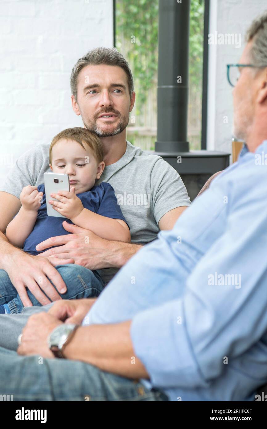 Generations talk hi-res stock photography and images - Alamy